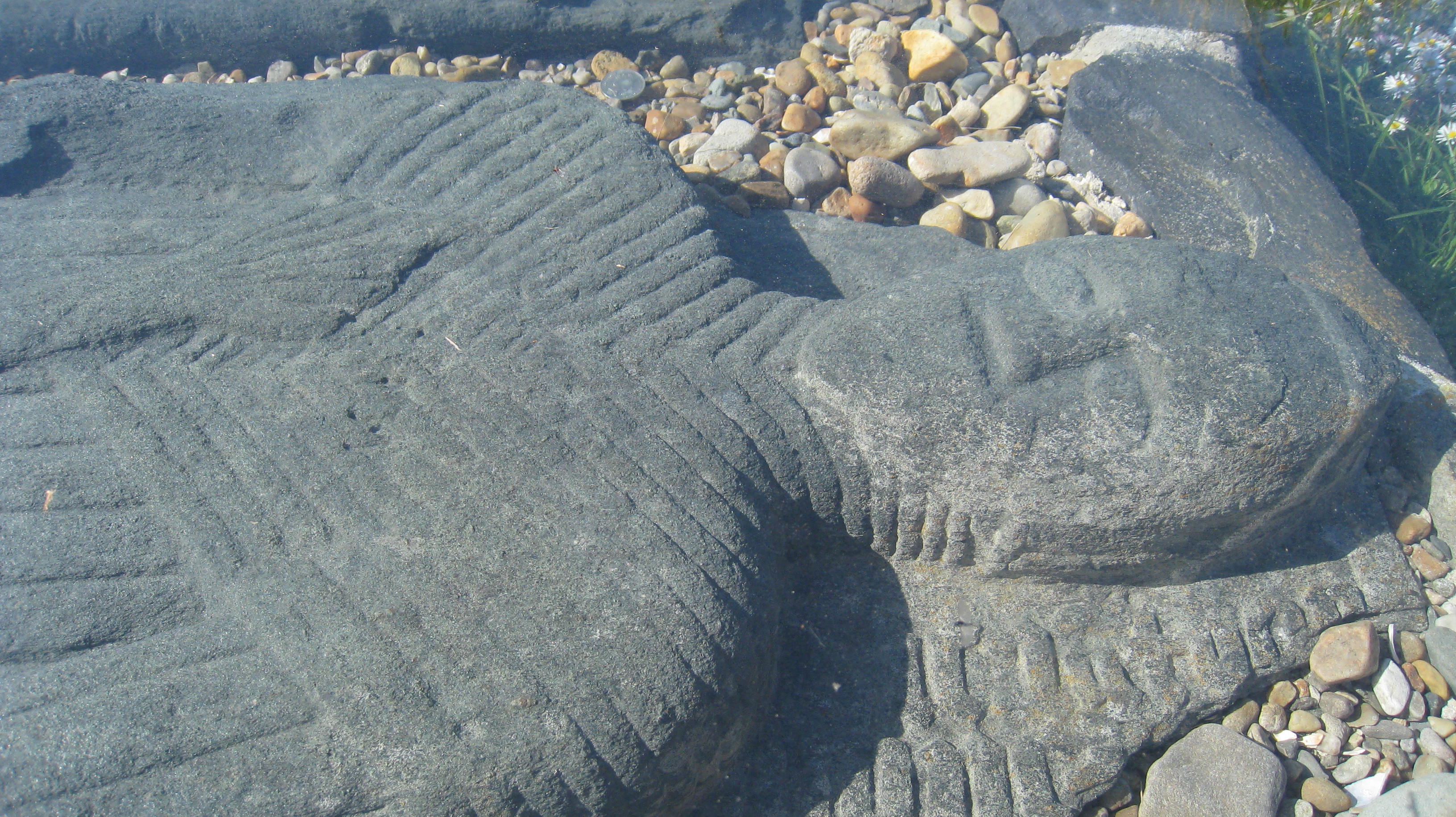 5165_Closeup of face on grave, Finlaggan | grand tour of the middling sort